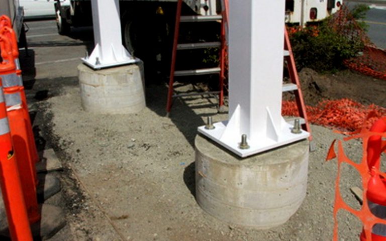 concrete-contracting-foundations-double-sign-pillars | Grant Signs